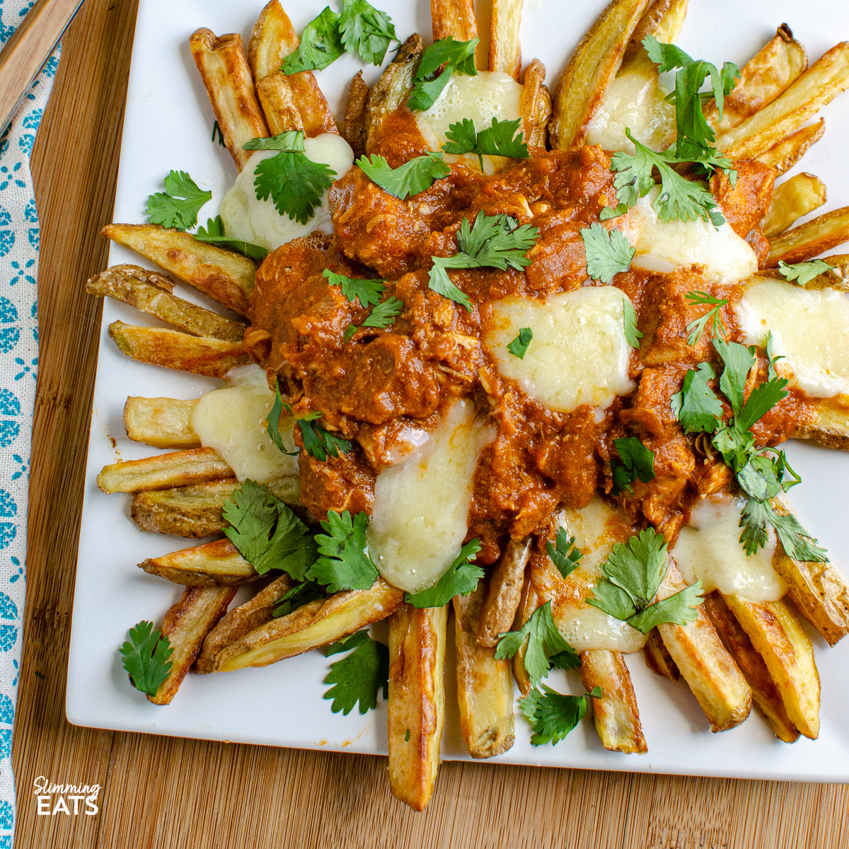 Butter Chicken Poutine - Slimming Eats